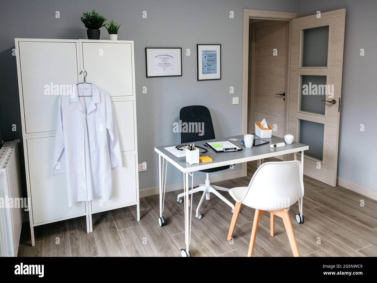 Interior of empty doctor's office Stock Photo - Alamy