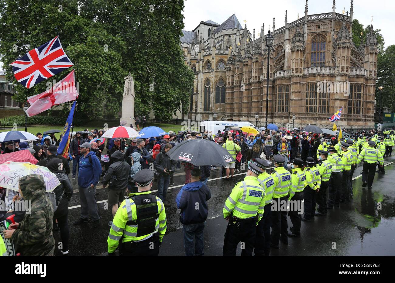 Protesters gather outside the House of Parliament during the ...