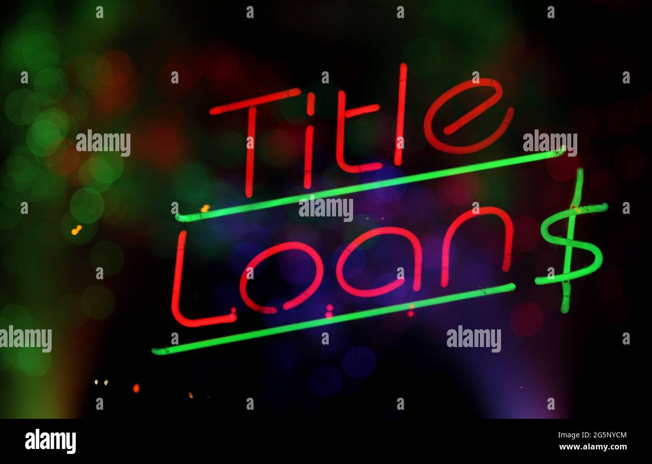Loans Vintage Neon Title Loan Sign in Office Window Stock Photo - Alamy