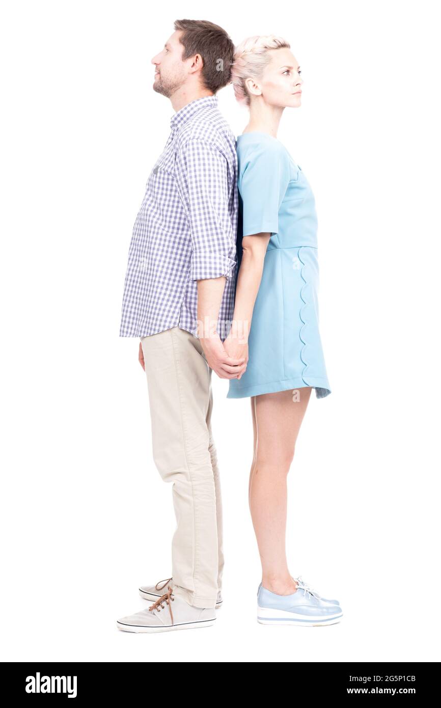 Vertical full length studio shot of modern Caucasian man and woman ...
