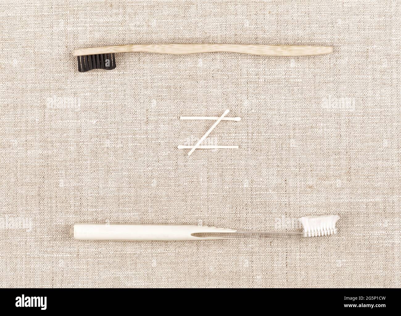 New and used toothbrush on wooden background. Recycling plastic concept ...