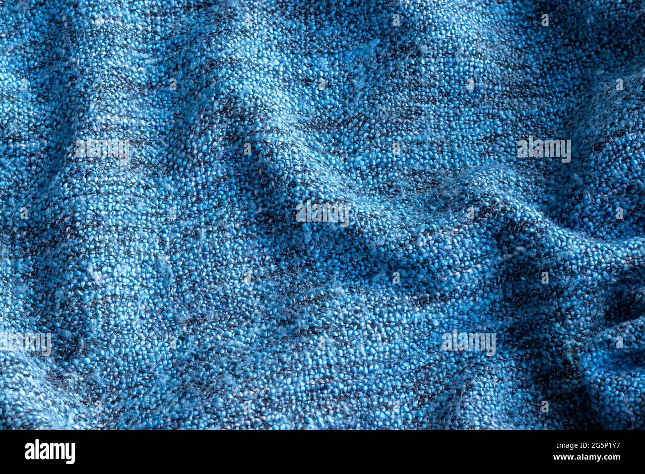 Bright blue knitted fabric texture. Crumpled blanket background Stock ...