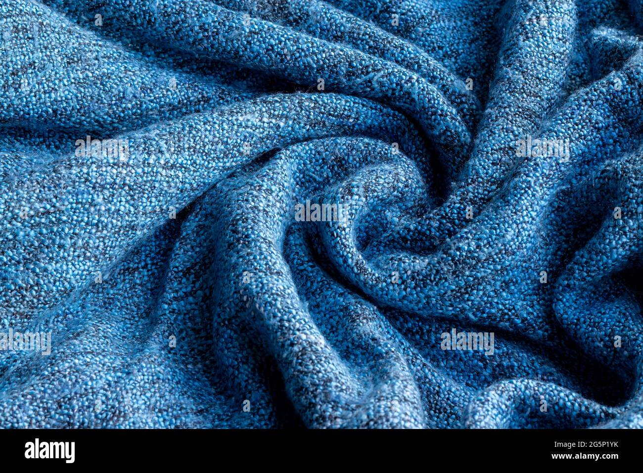 Bright blue knitted fabric texture. Crumpled twisted blanket background ...