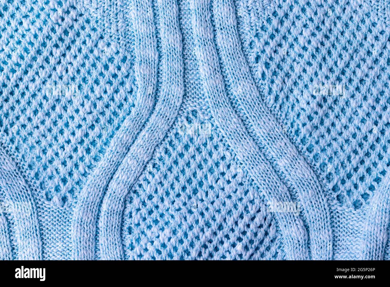 Bright blue knitted fabric texture. Rough sweater pattern background ...