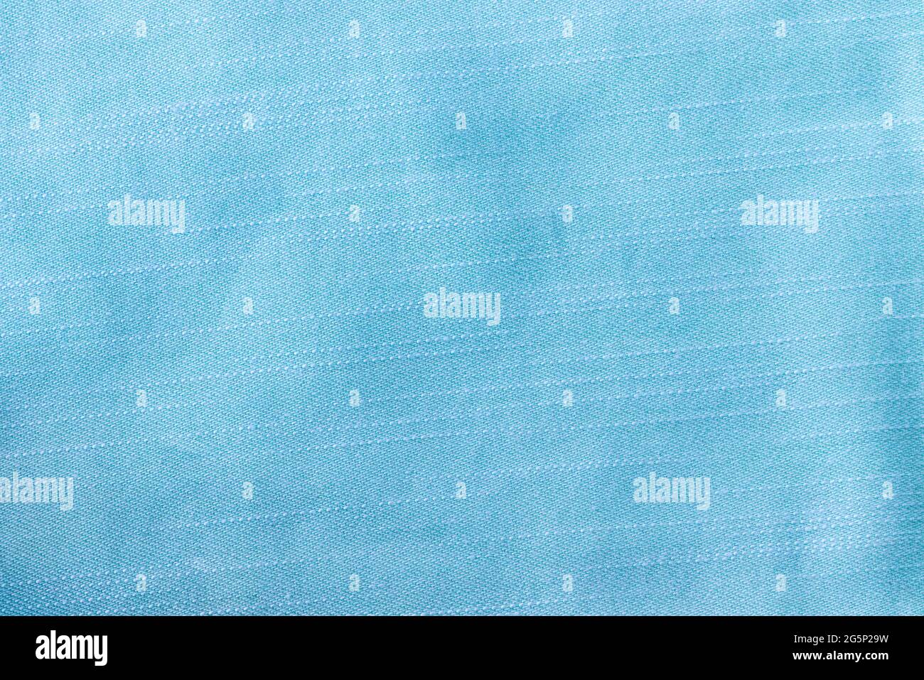 Soft blue, turquoise cotton fabric texture background with stitched ...