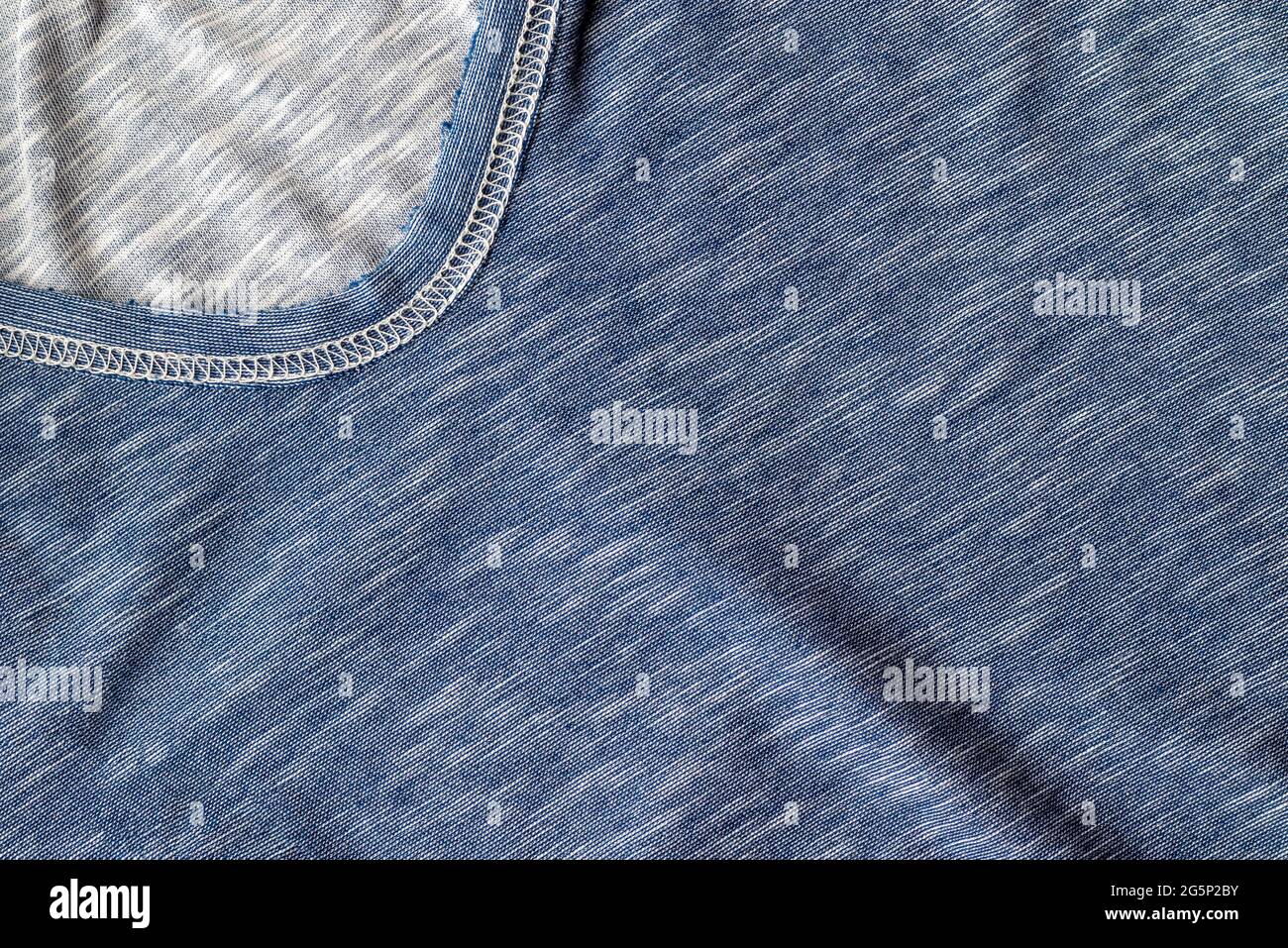 Cotton jersey t-shirt with neckline fabric texture. Crumpled blue and ...