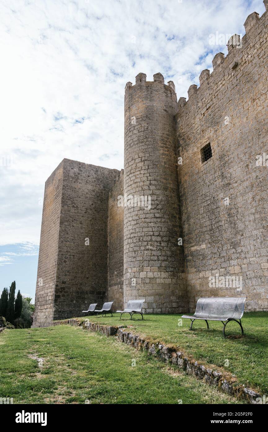 Facade of a 13th century medieval castle with several benches Stock ...