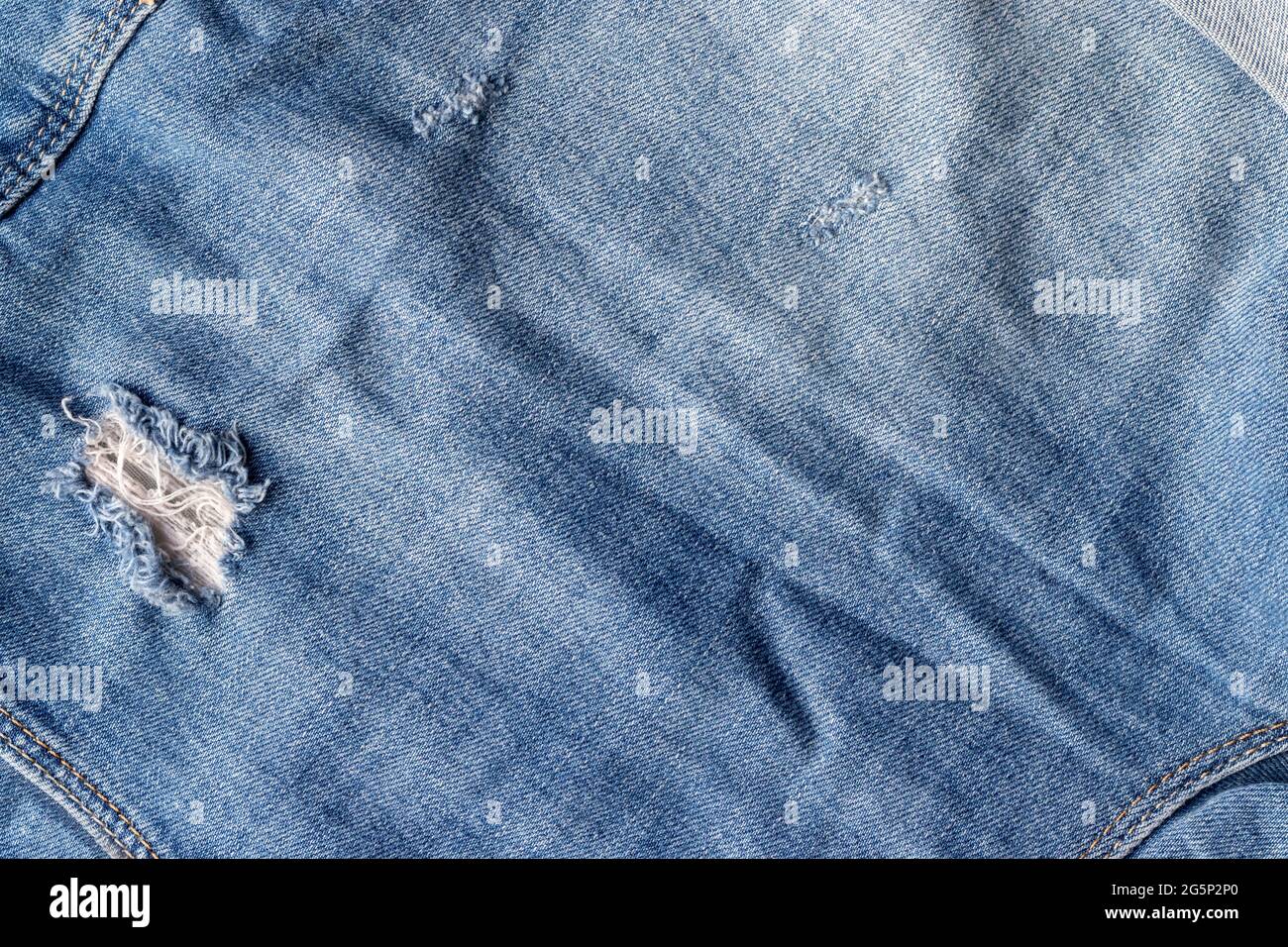 Torn Denim Wallpaper