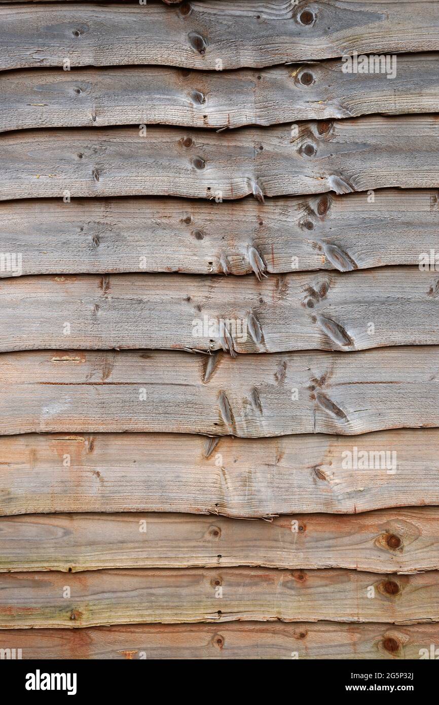 Texture of weathered overlap wooden fence panel Stock Photo - Alamy