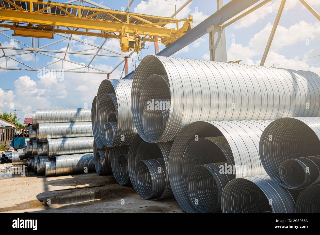 Ventilation pipe warehouse. Steel pipes, parts for the construction of ...