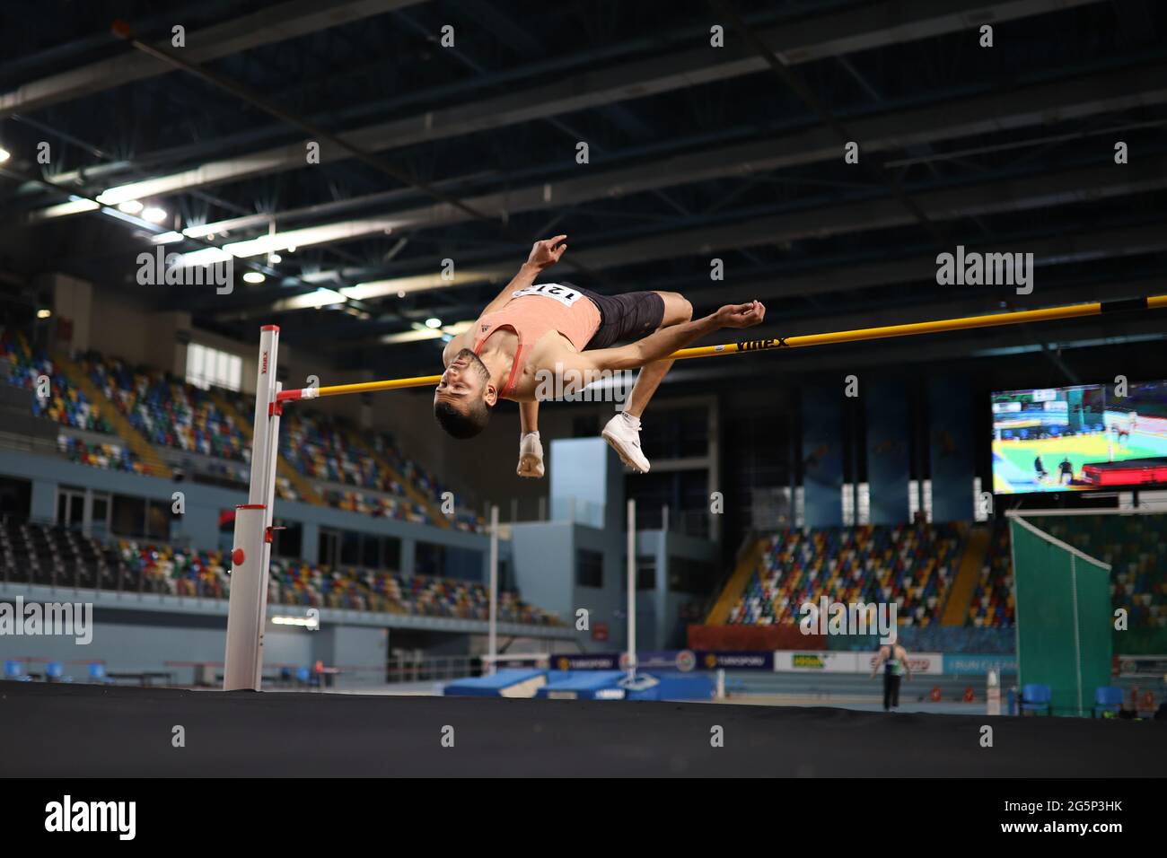 ISTANBUL, TURKEY - MARCH 06, 2021: Undefined athlete high jumping ...
