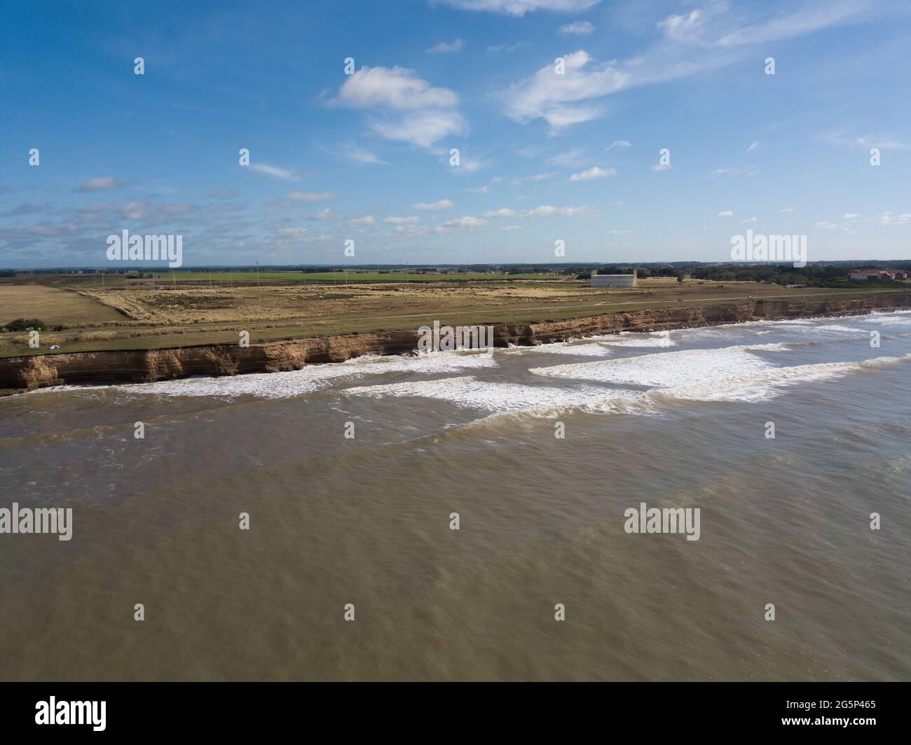 Aerial view of cliffs by the sea Stock Photo - Alamy