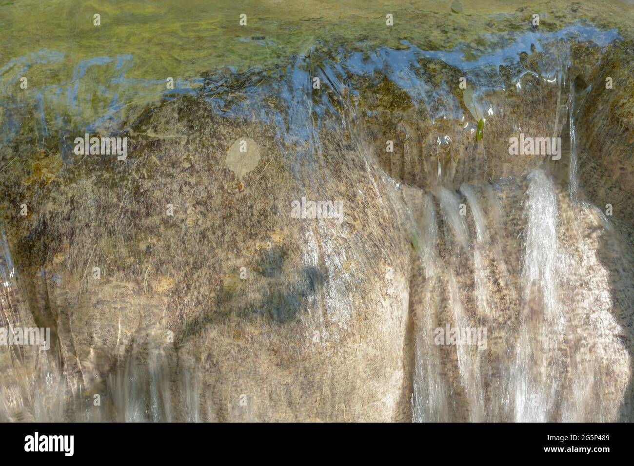 The tufa waterfall near Arbois. Crystal clear waterfall, powerful ...