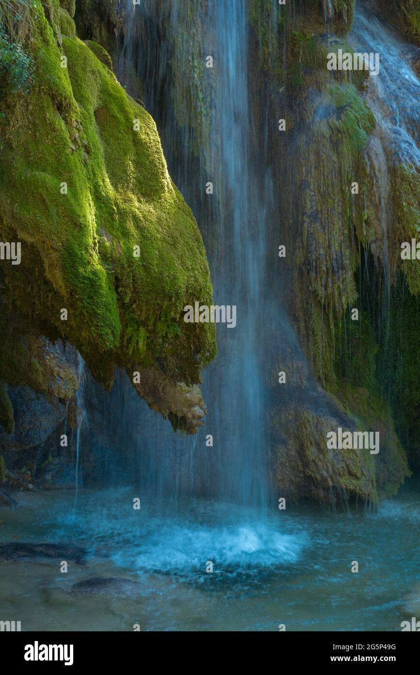 The tufa waterfall near Arbois. Crystal clear waterfall, powerful ...