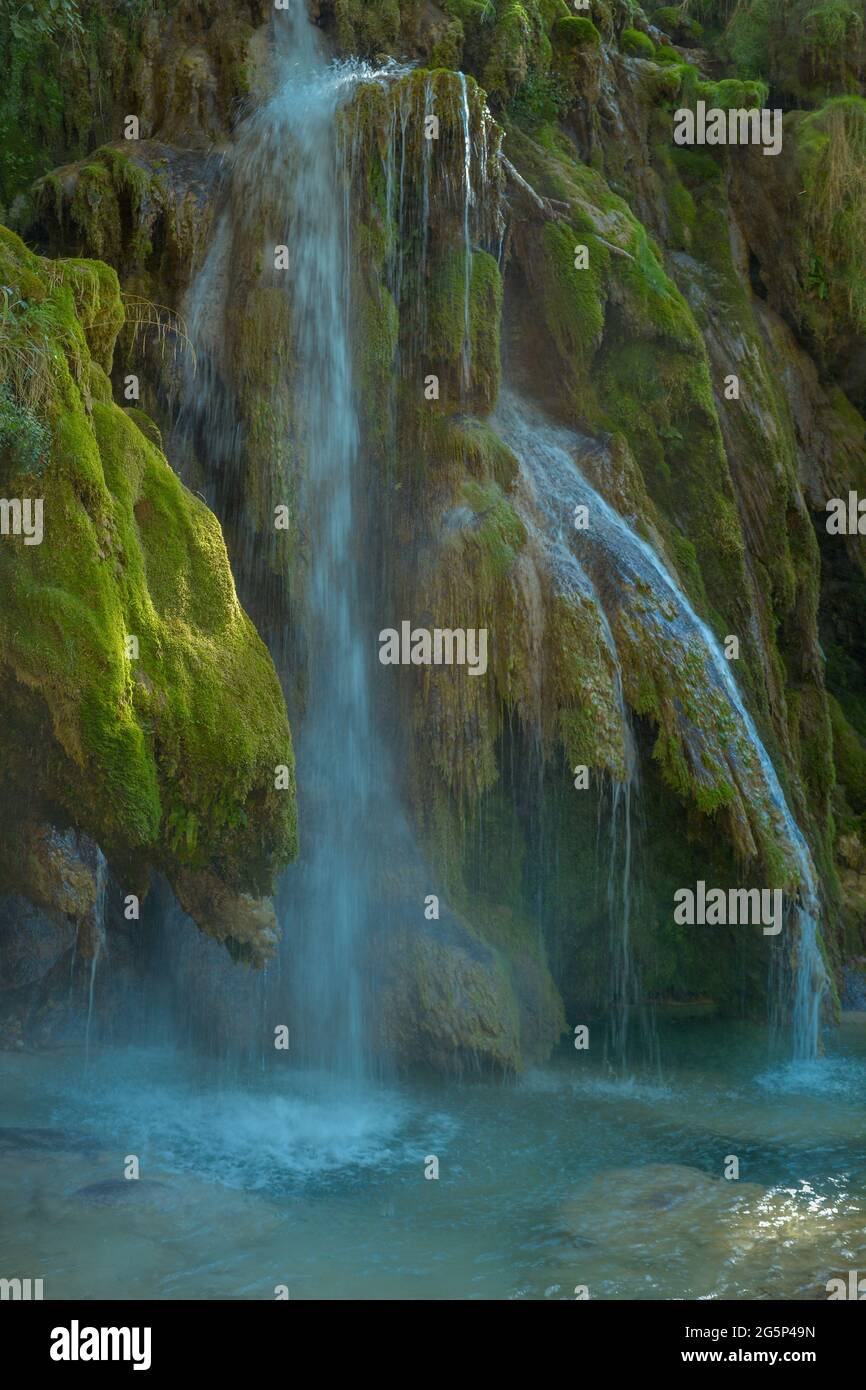 The tuf waterfall near Arbois. Crystal clear waterfall, powerful ...