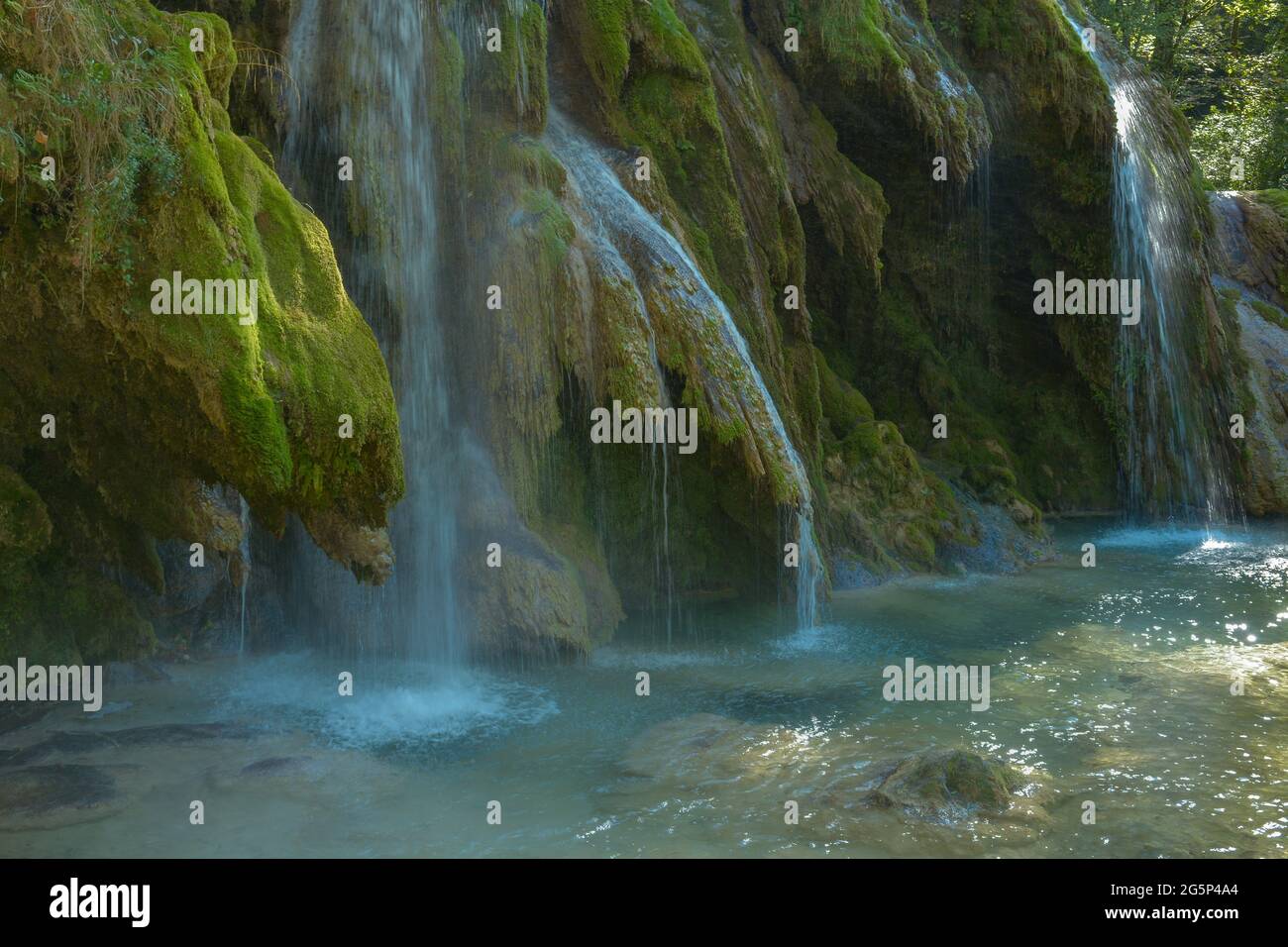 The tuf waterfall near Arbois. Crystal clear waterfall, powerful ...