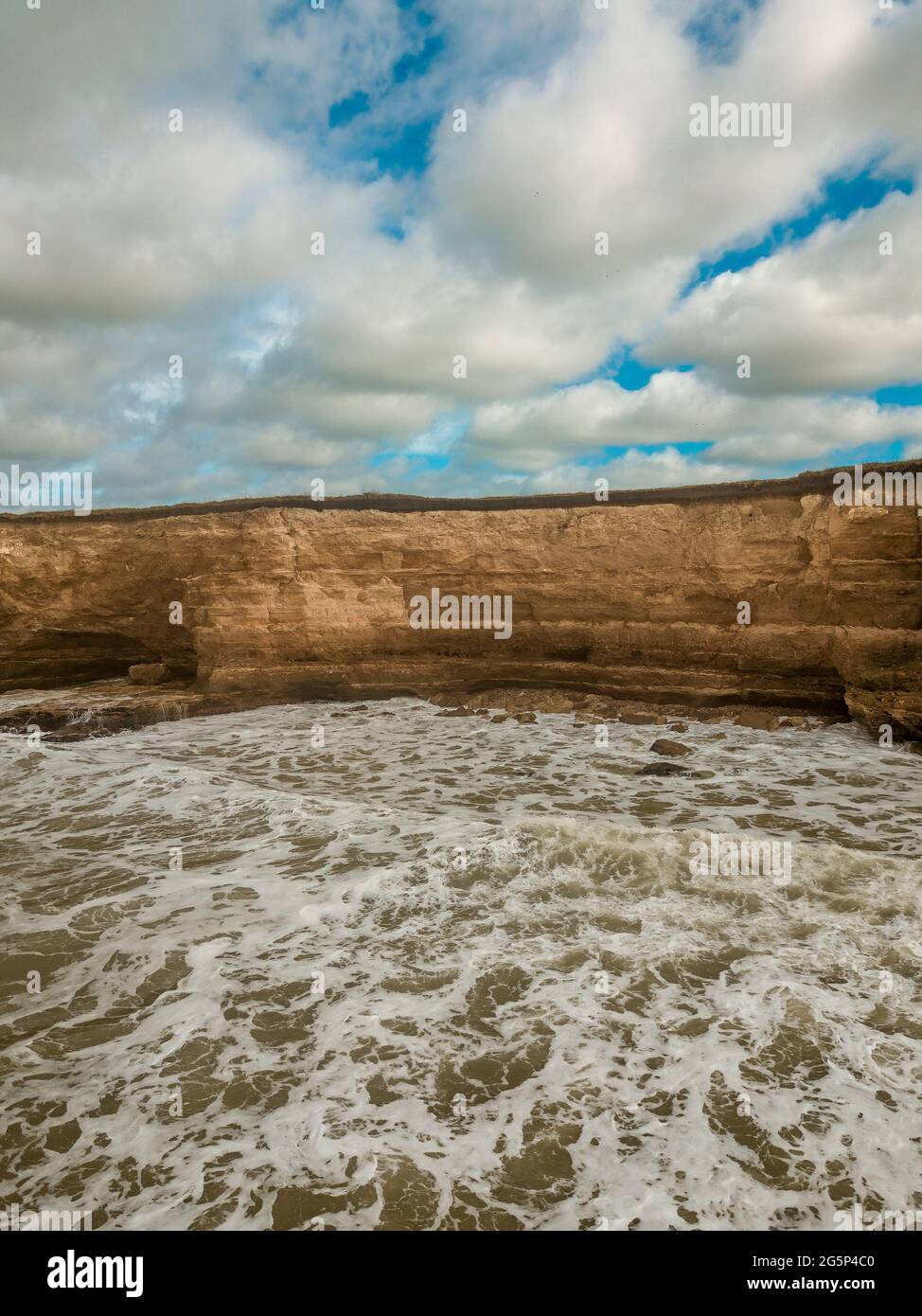 Aerial view of cliffs by the sea Stock Photo - Alamy
