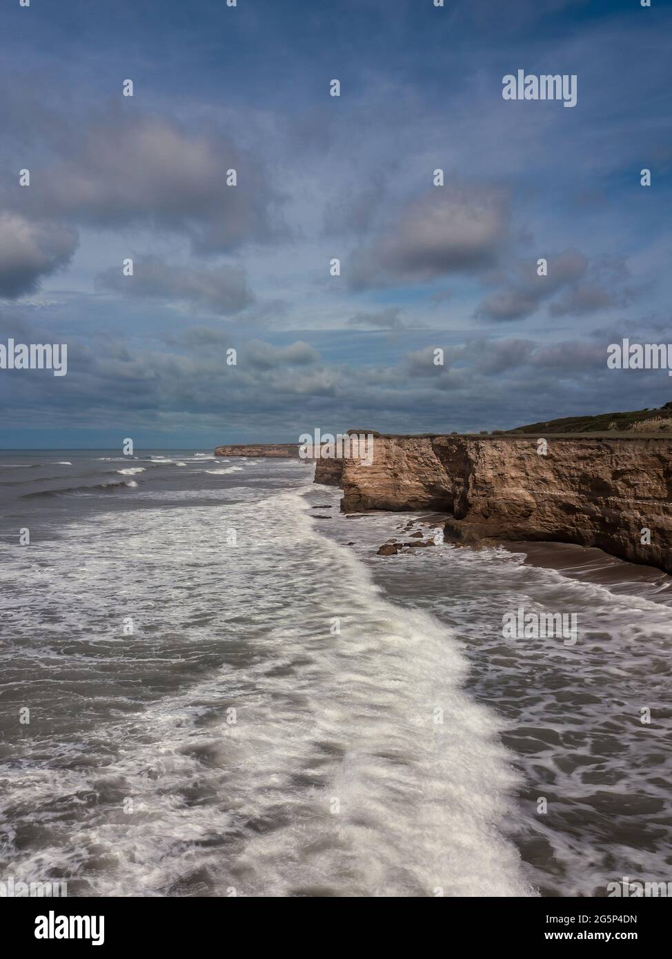 Aerial view of cliffs by the sea Stock Photo - Alamy