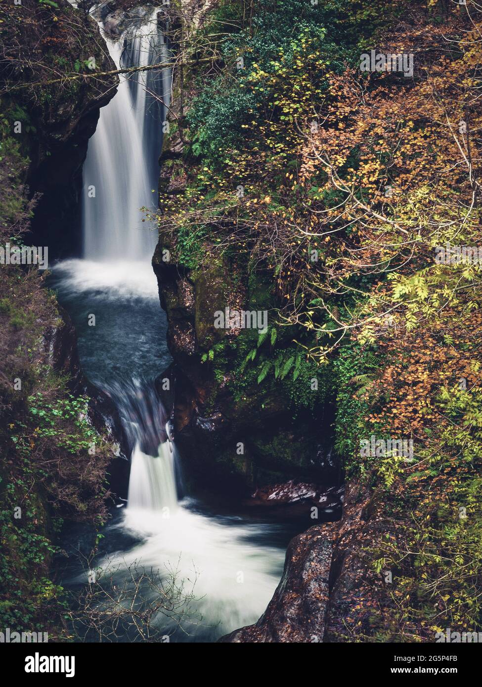 Water cascades from a river Stock Photo - Alamy
