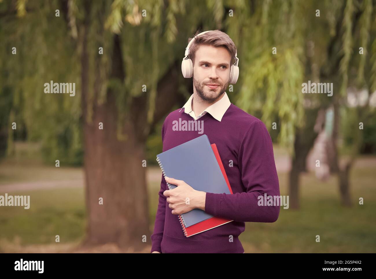 student get information from book. elearning concept. man listen music ...