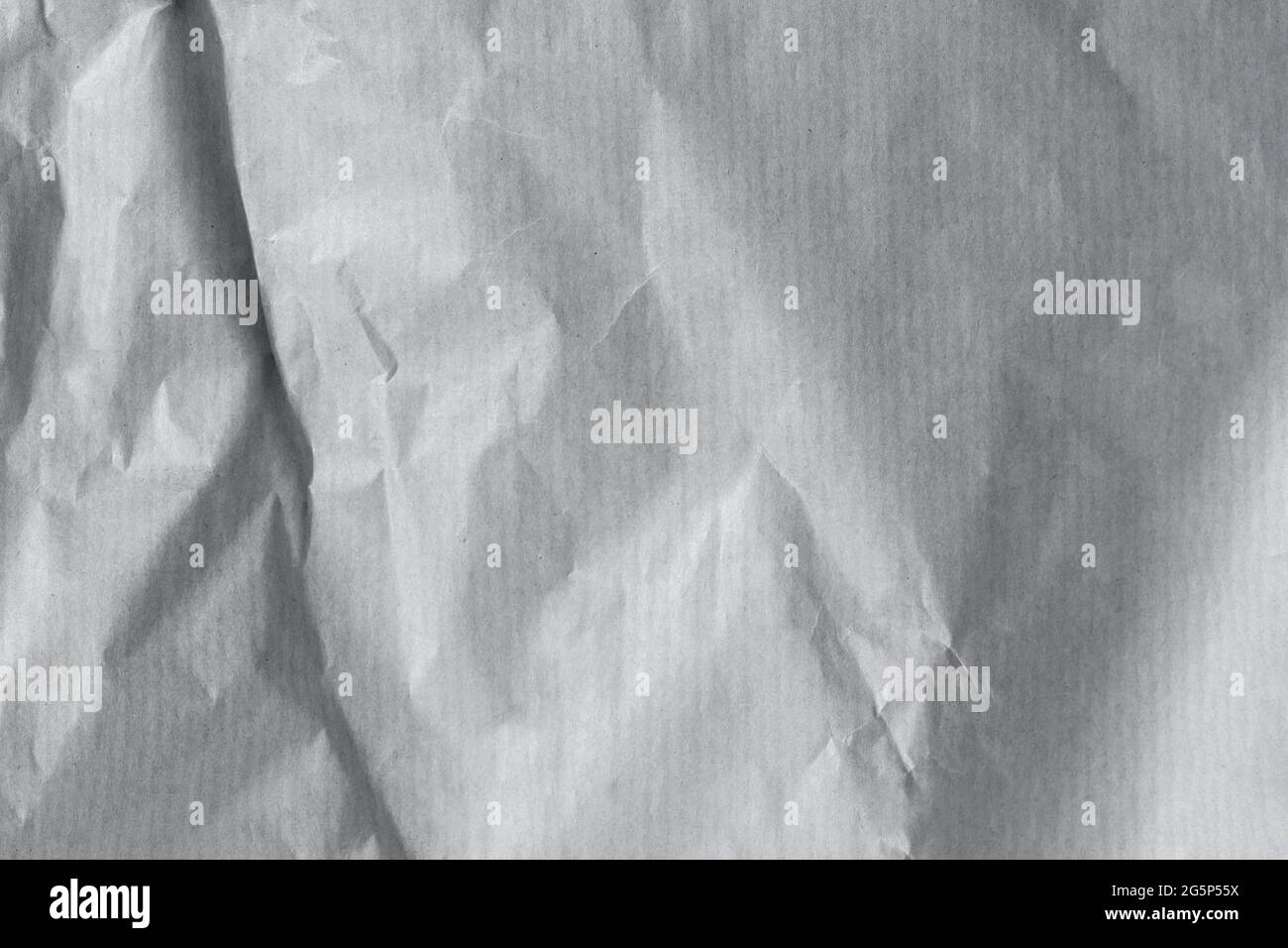 Crumpled gray craft paper background texture Stock Photo - Alamy