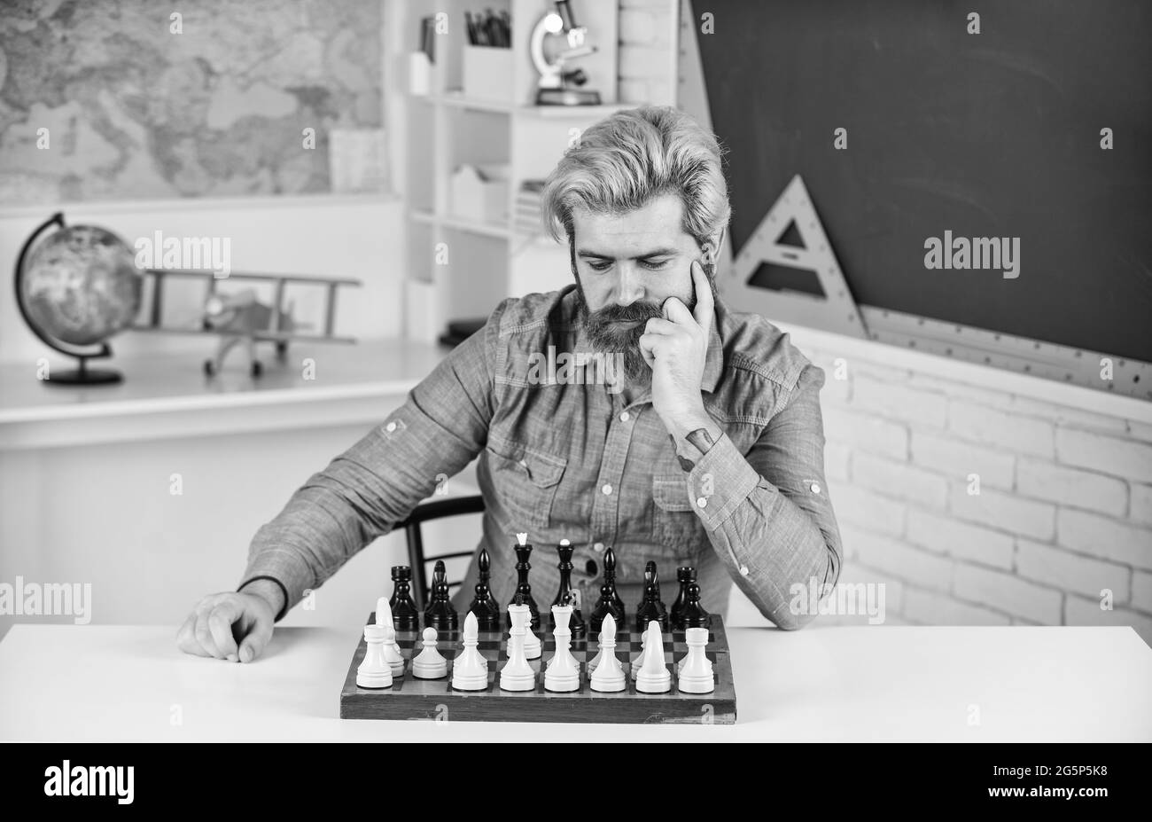 Figures on chess board. Intellectual hobby. Thinking about next step ...