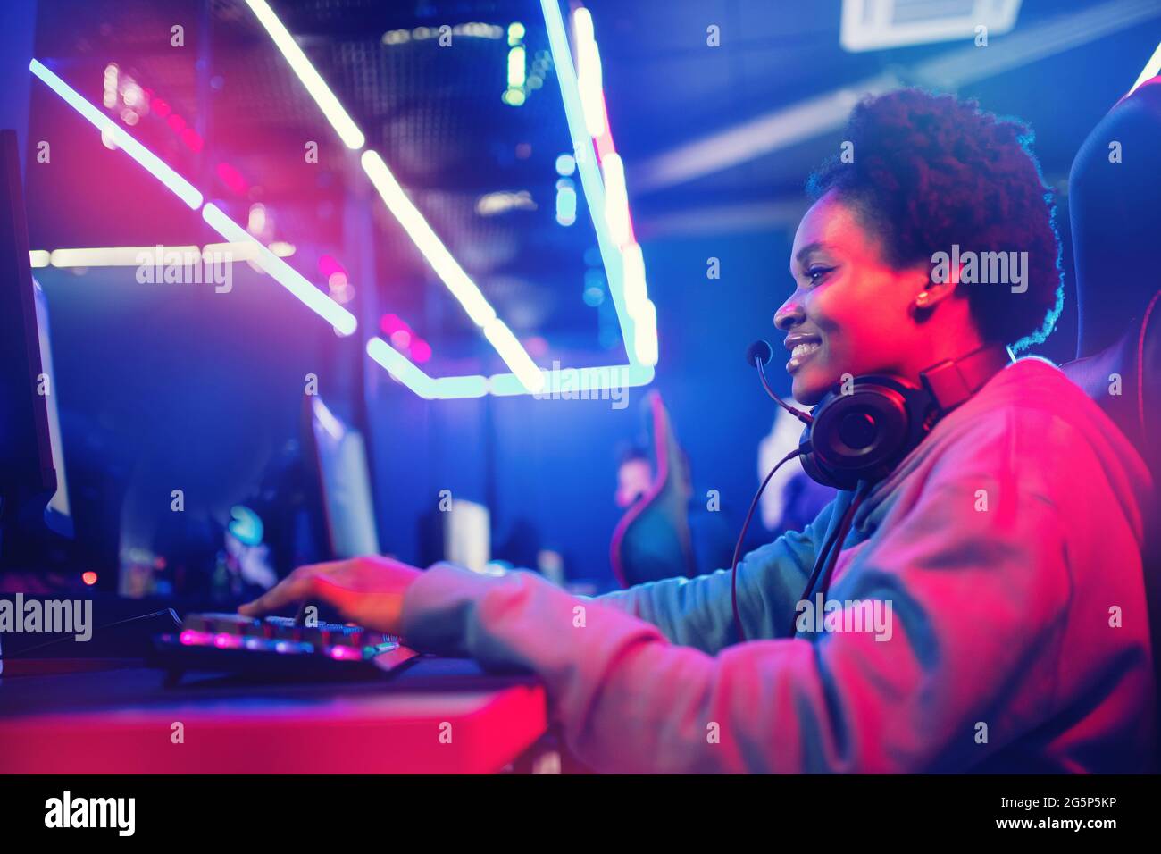 Happy Streamer African American woman play gamer playing online video ...