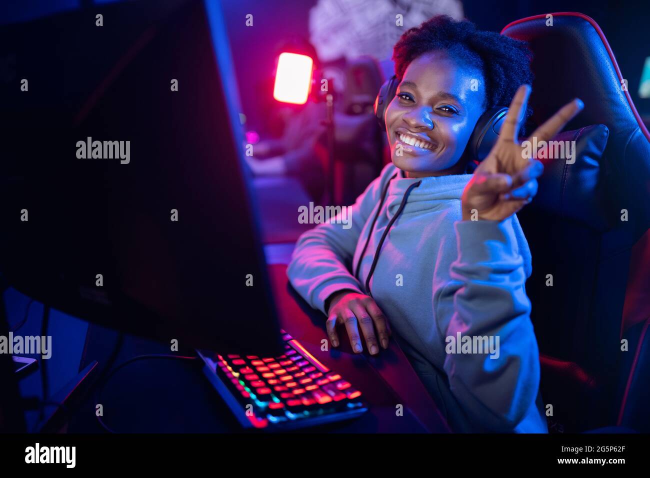 Happy Streamer African young woman professional cyber gamer online ...