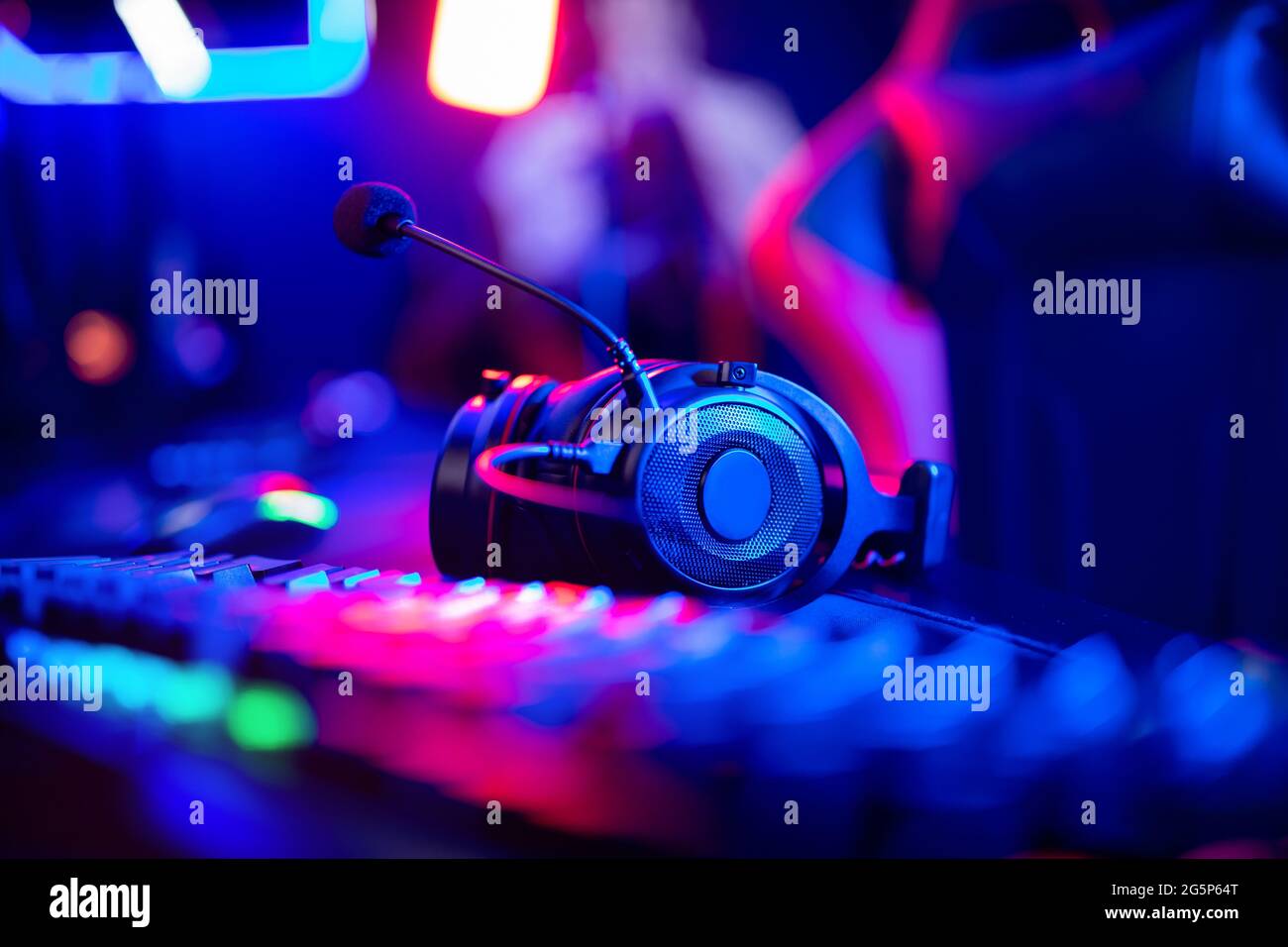 Headphones with microphone for video games and cyber esports on neon ...