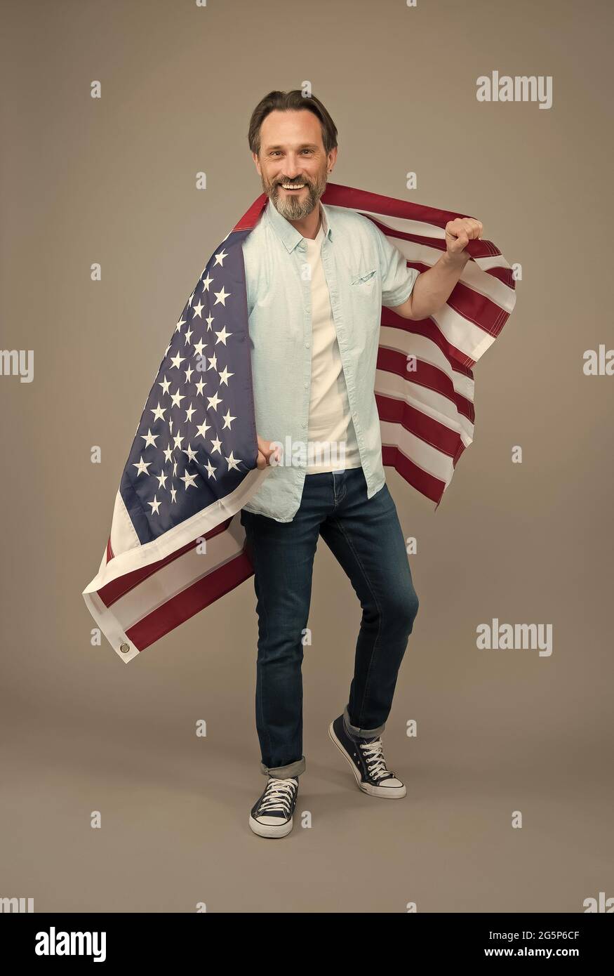 Immigration to USA. Mature man hold US flag. Visa for immigration ...