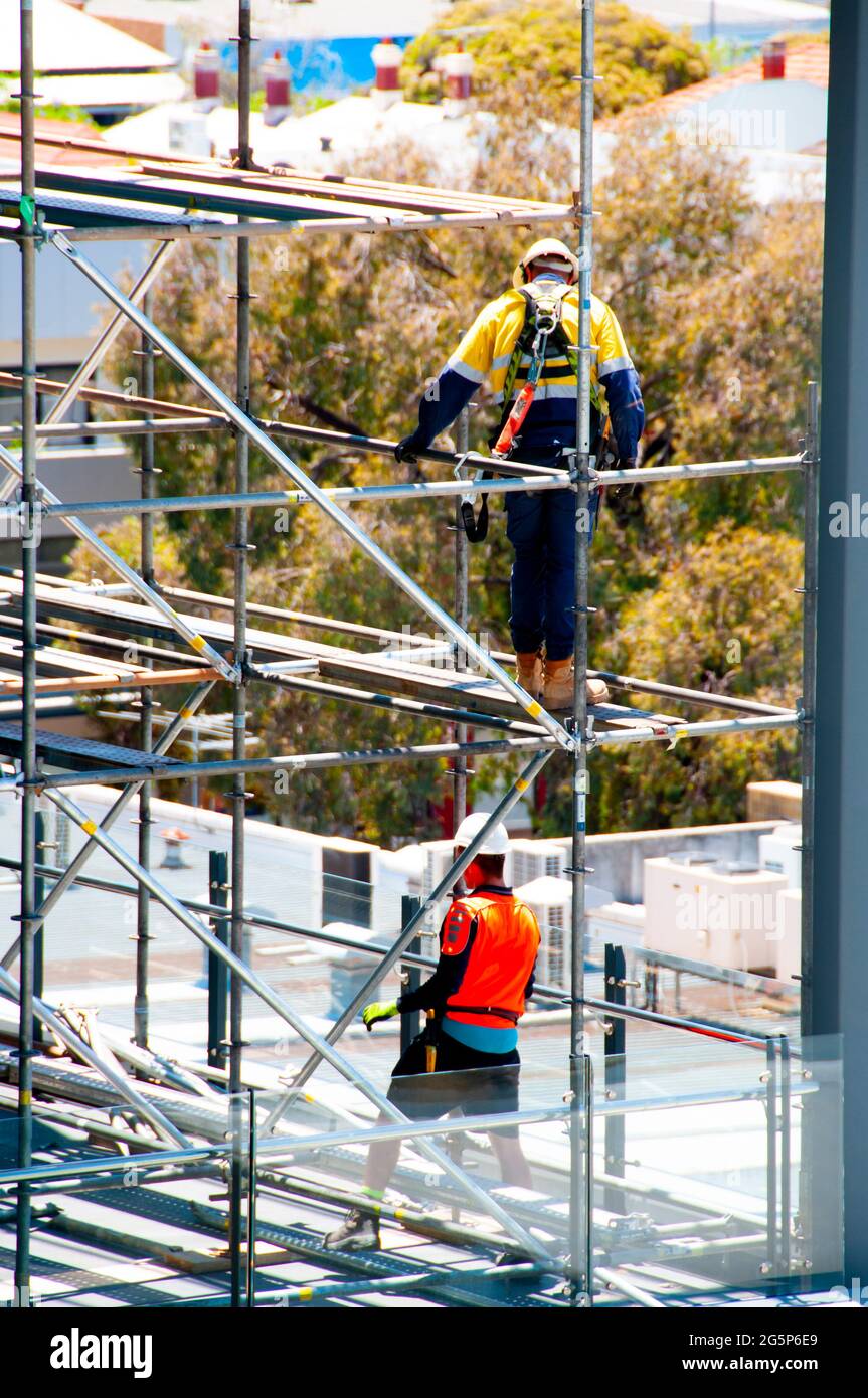 Construction Worker in a Scaffold Stock Photo - Alamy
