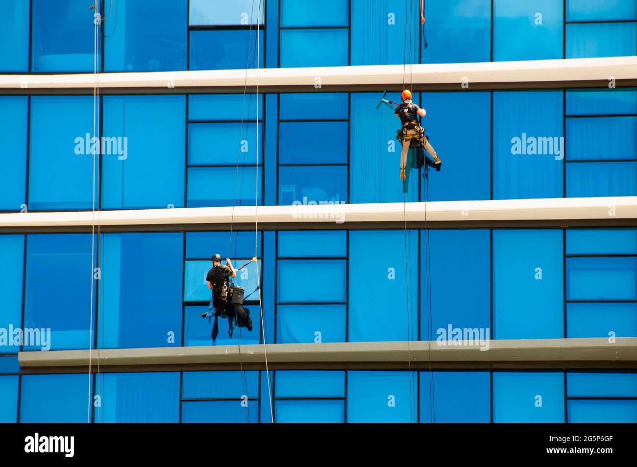 Windows Cleaning on City Building Stock Photo - Alamy