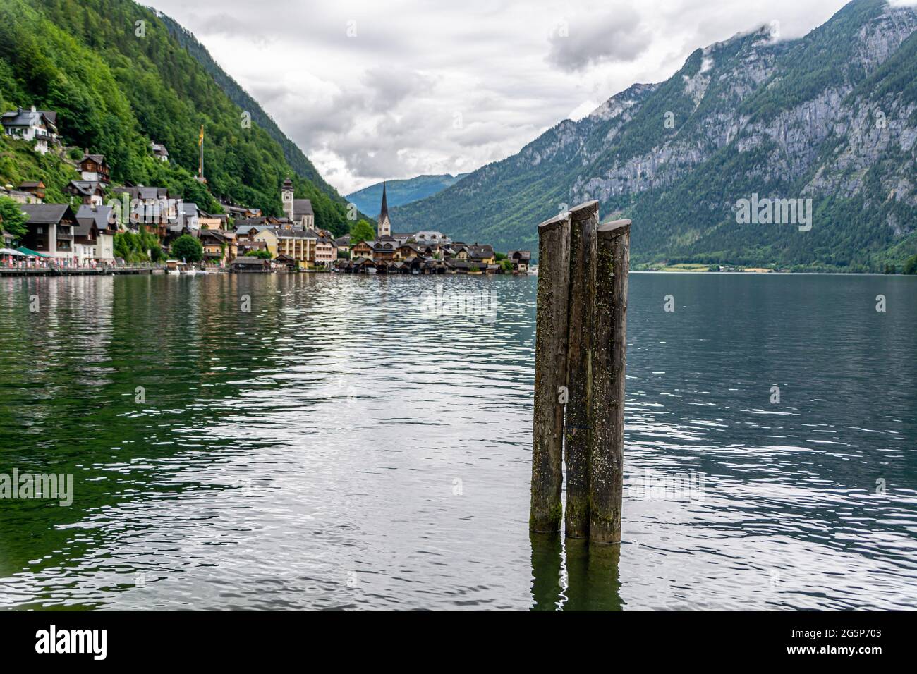 Historic Halstatt town with lake and Alps mountain at the background in ...
