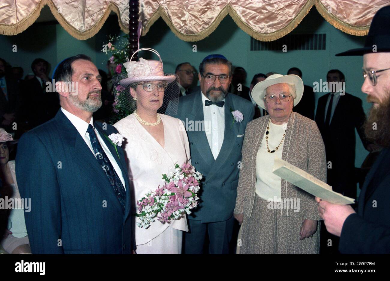 A mature Jewish couple marry beneath the chupah in a Birmingham ...