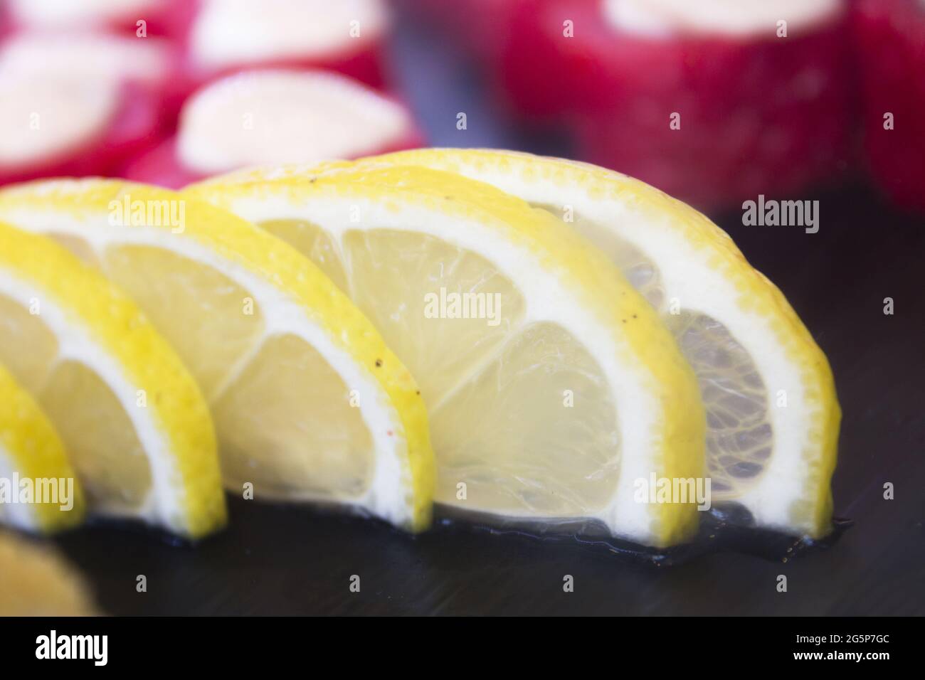 Fresh lemon cut into halves. No people Stock Photo - Alamy