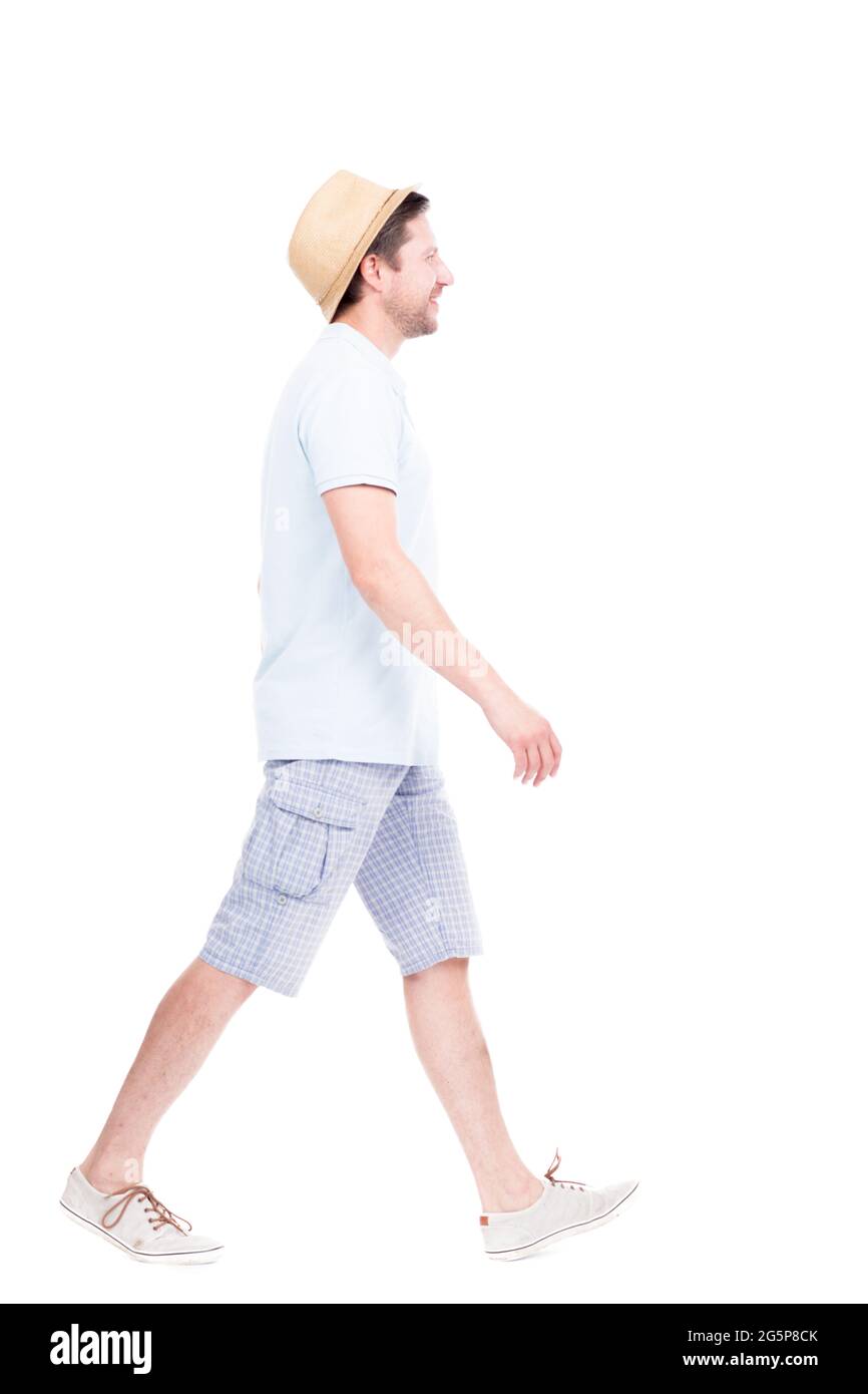 Vertical full length side view portrait of handsome bearded Caucasian ...