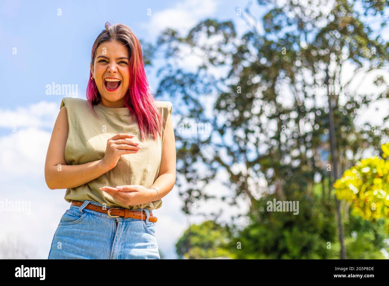 Happy young woman expressive hi-res stock photography and images - Alamy