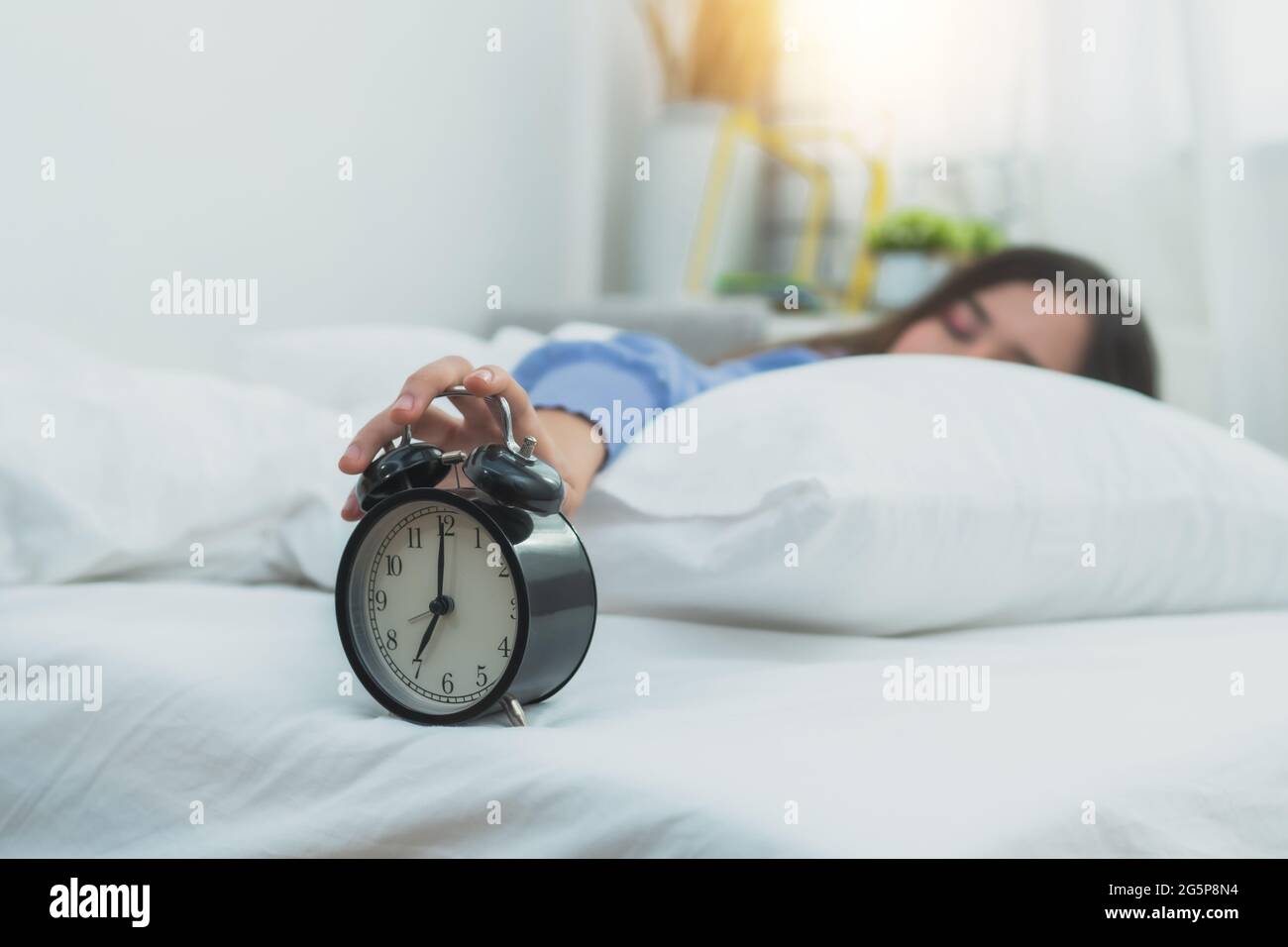 beautiful woman sleep on bed and get up late Stock Photo - Alamy