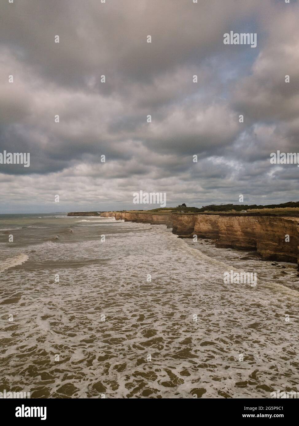 Aerial view of cliffs by the sea Stock Photo - Alamy