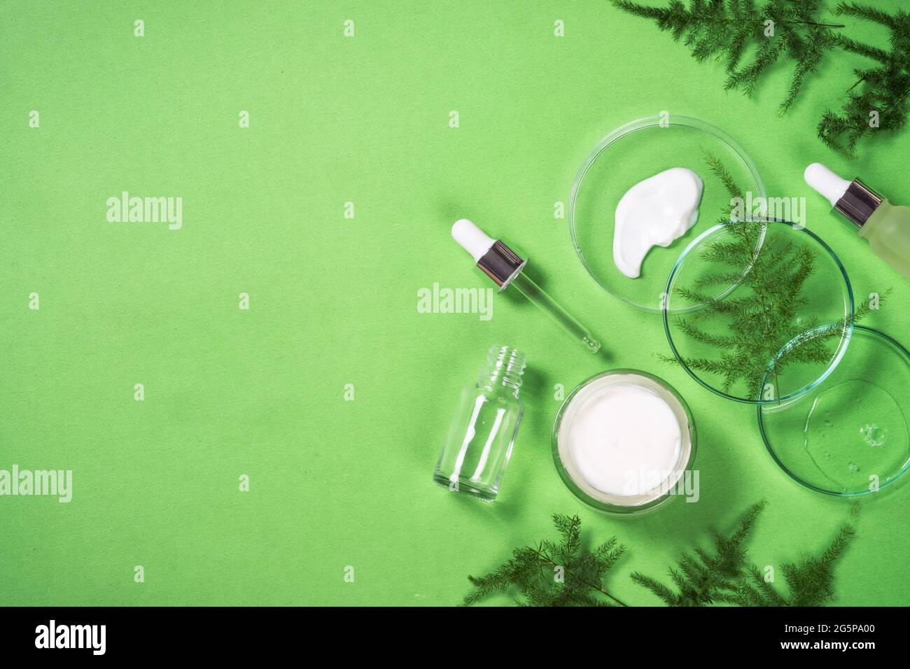 Cosmetic laboratory concept with green plants Stock Photo - Alamy