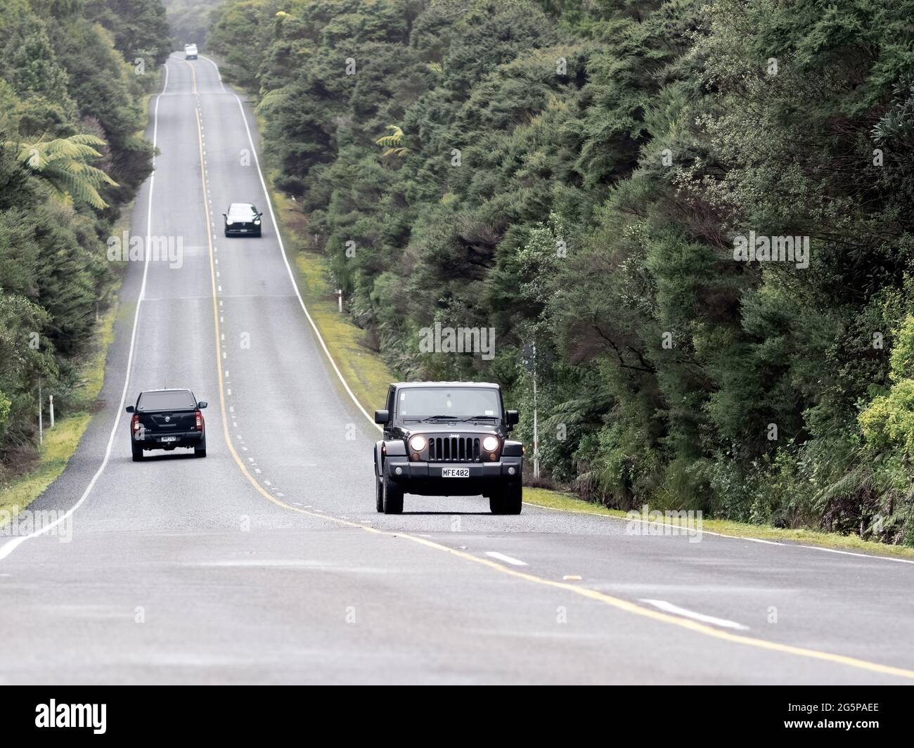AUCKLAND, NEW ZEALAND - Jun 26, 2021: View of cars driving on hilly ...