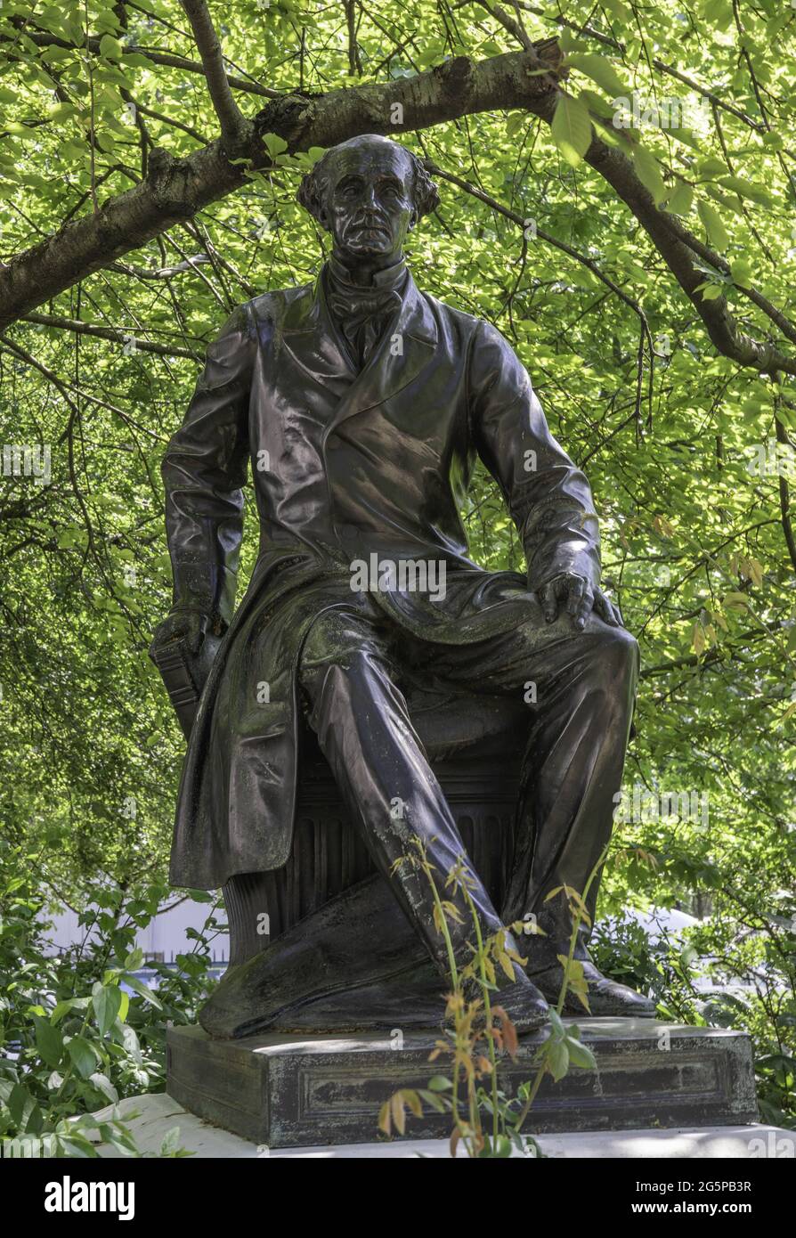 LONDON, UNITED KINGDOM - Jun 23, 2021: John Stuart Mill sculpture by T ...