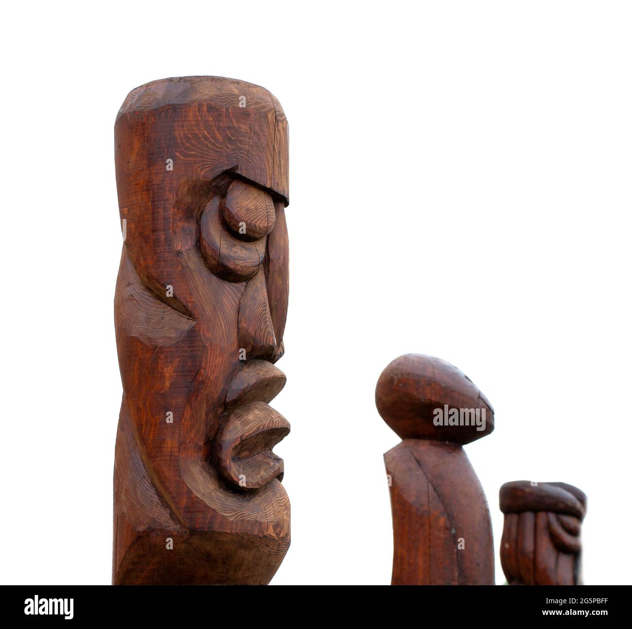 wooden idol statue of koryak on a white background Stock Photo - Alamy
