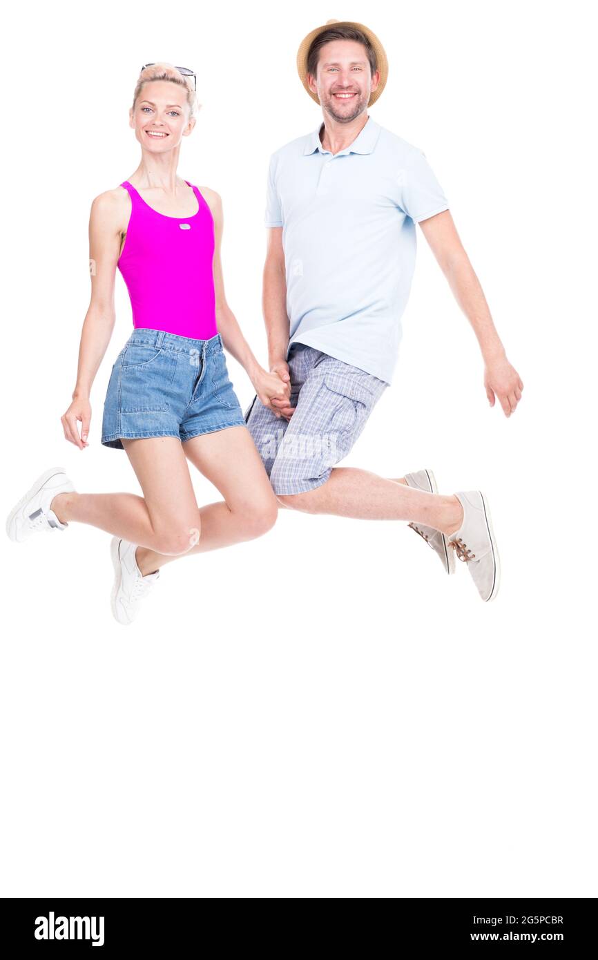 Vertical full length studio portrait of cheerful young adult Caucasian ...