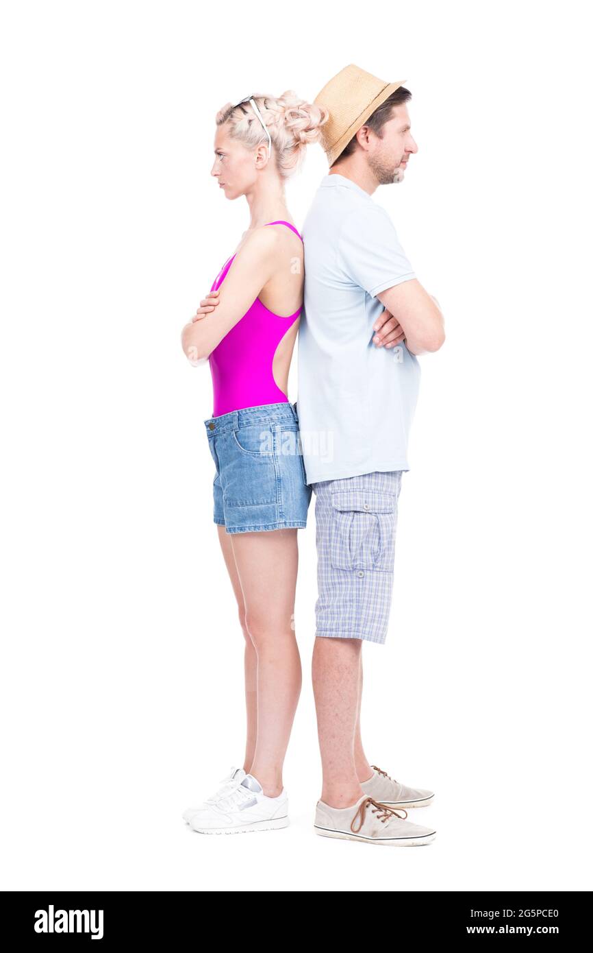 Vertical full length studio portrait of stylish young man and woman ...