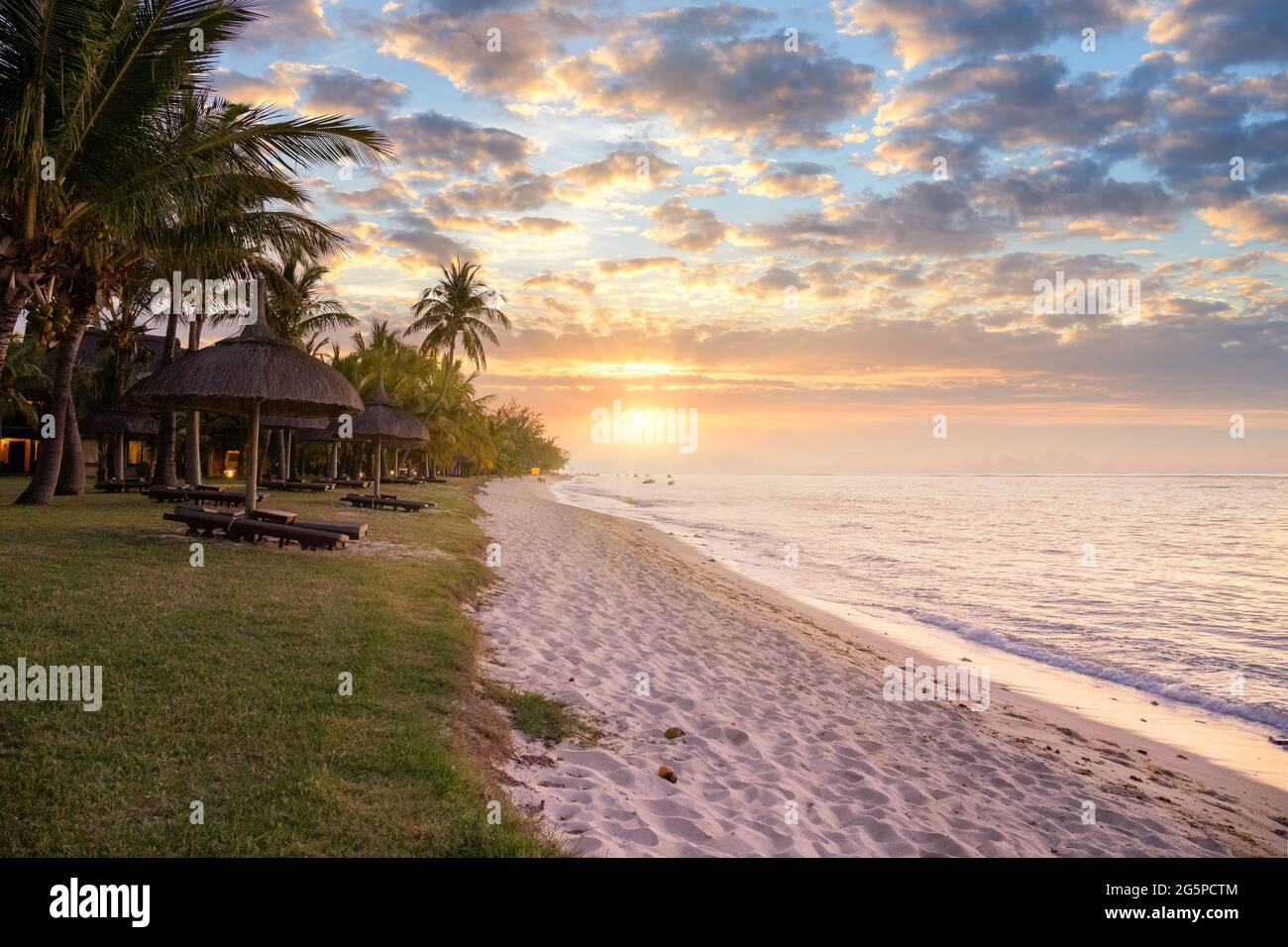 The beach in Le Morne Brabant at sunset, Mauritius, Africa Stock Photo ...