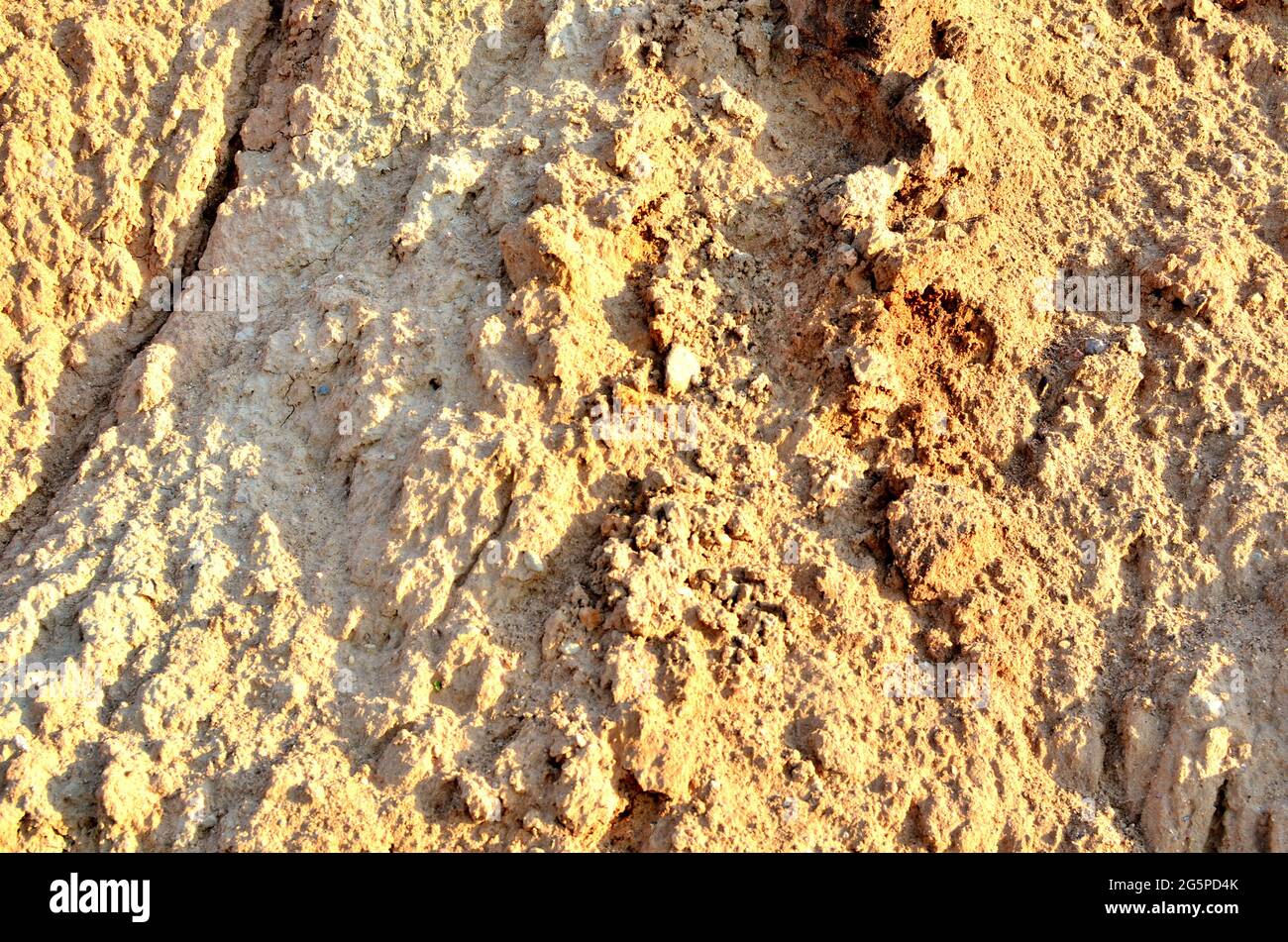 The texture of the many layers of sandy rock under the ground: clay ...