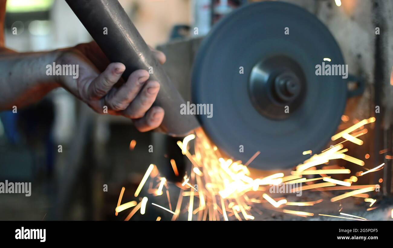 Closed Up Grinding Stone With Sparks Stock Photo - Alamy