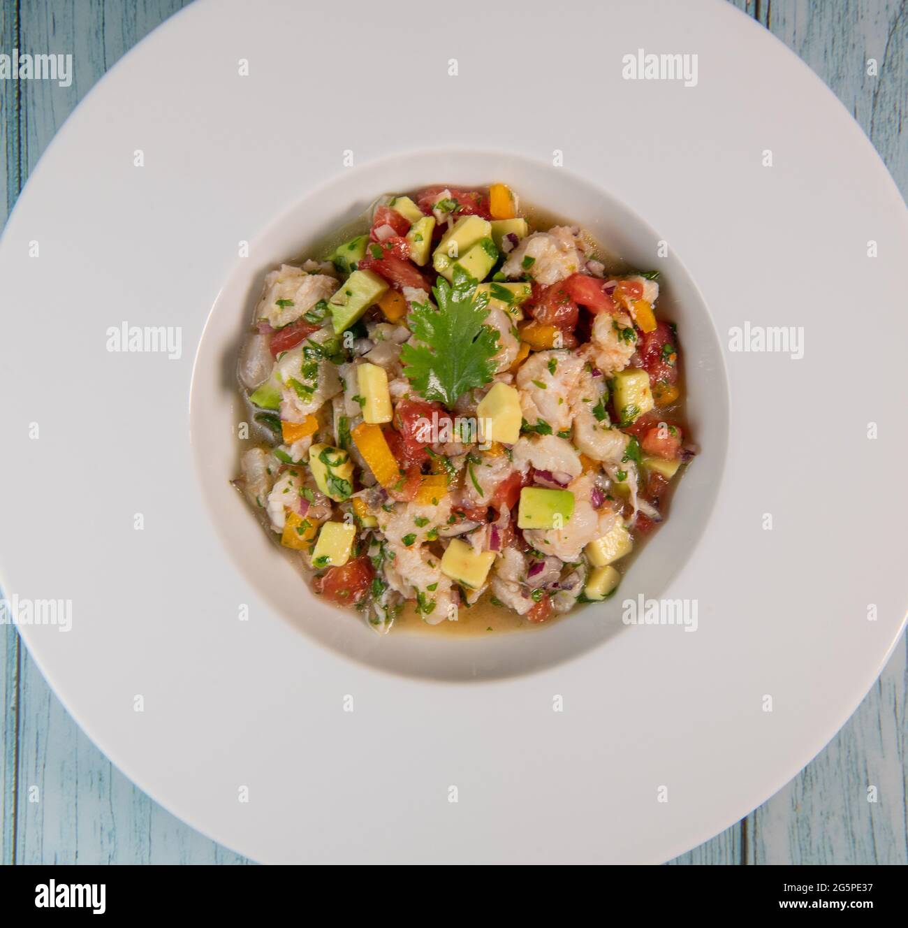 Cod Ceviche recipe, bread in oil and garlic Stock Photo - Alamy