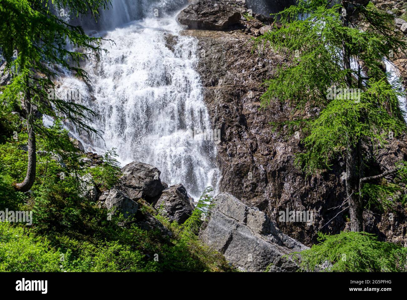 Waterfall in the Austrian Alps. Natural mountain landscape with fresh ...